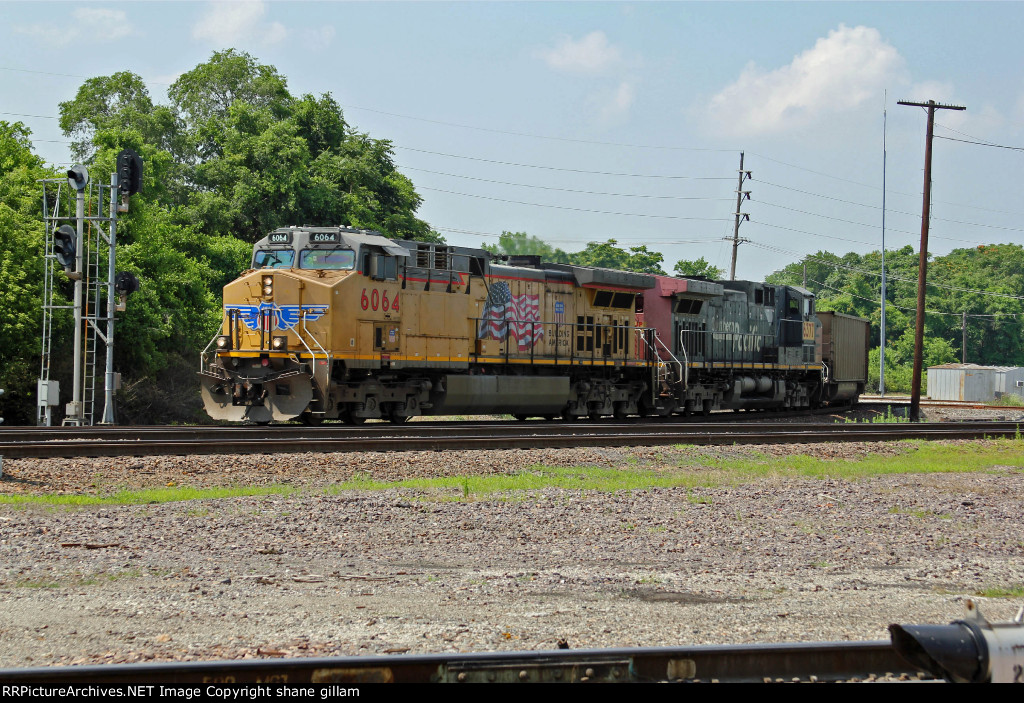 UP 6064 Heads up a SB coal train.